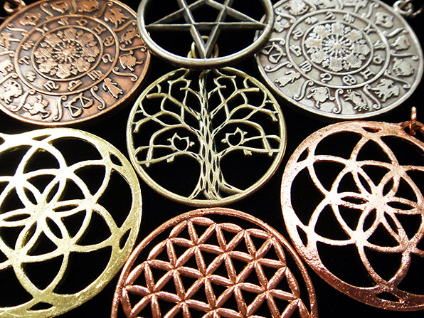 Sacred Symbol Pendants – Tika